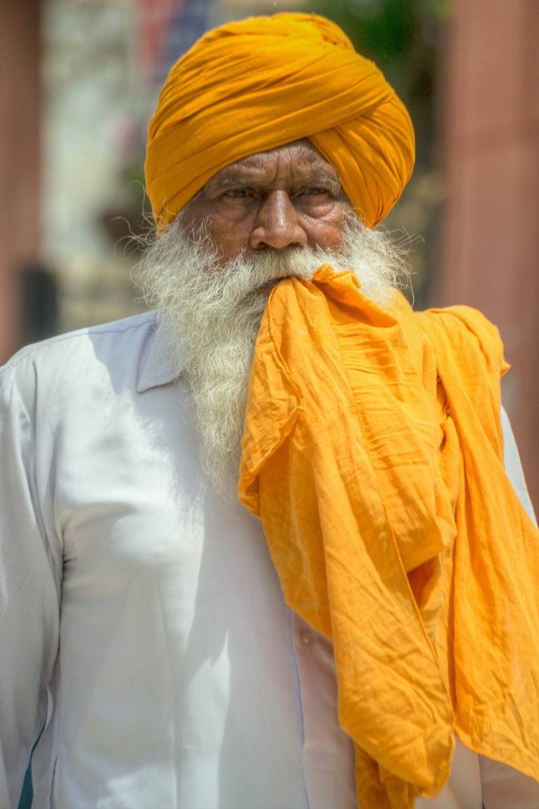 Man with orange turban Photography by Christopher William Adach ...
