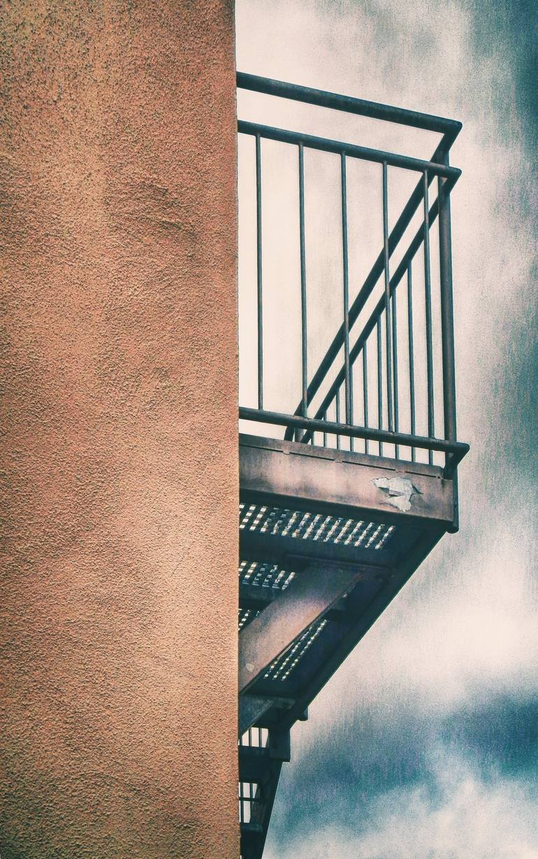 A vertical low angle of a classic postmodern balcony Photography by ...