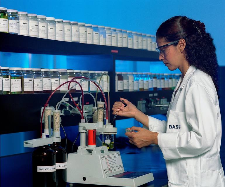 Lab technician controlling liquids 1997 BASF Altamira Photography by ...