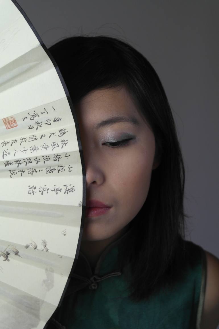 Miao whit a man's fan and closed eyes Photography by city atelier ...