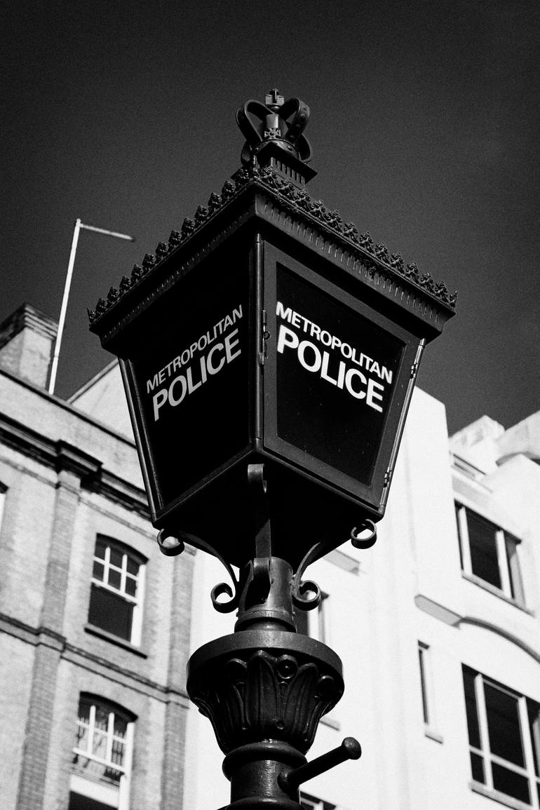 metropolitan police blue lamp sign outside a police station London ...