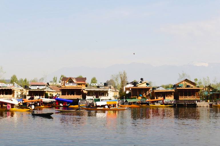 Wooden boats, shikaras and houseboats in the Dal Lake in Srinagar ...
