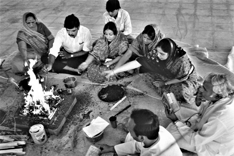 Hindu family praying fire ritual homa havan, India, 1973 Photography by ...