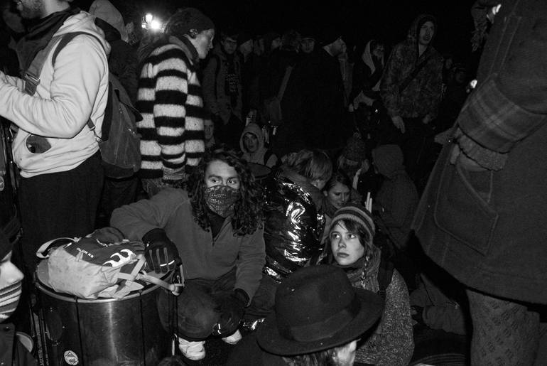 Students sitting stuck on London Bridge 2010 demo Photography by John ...